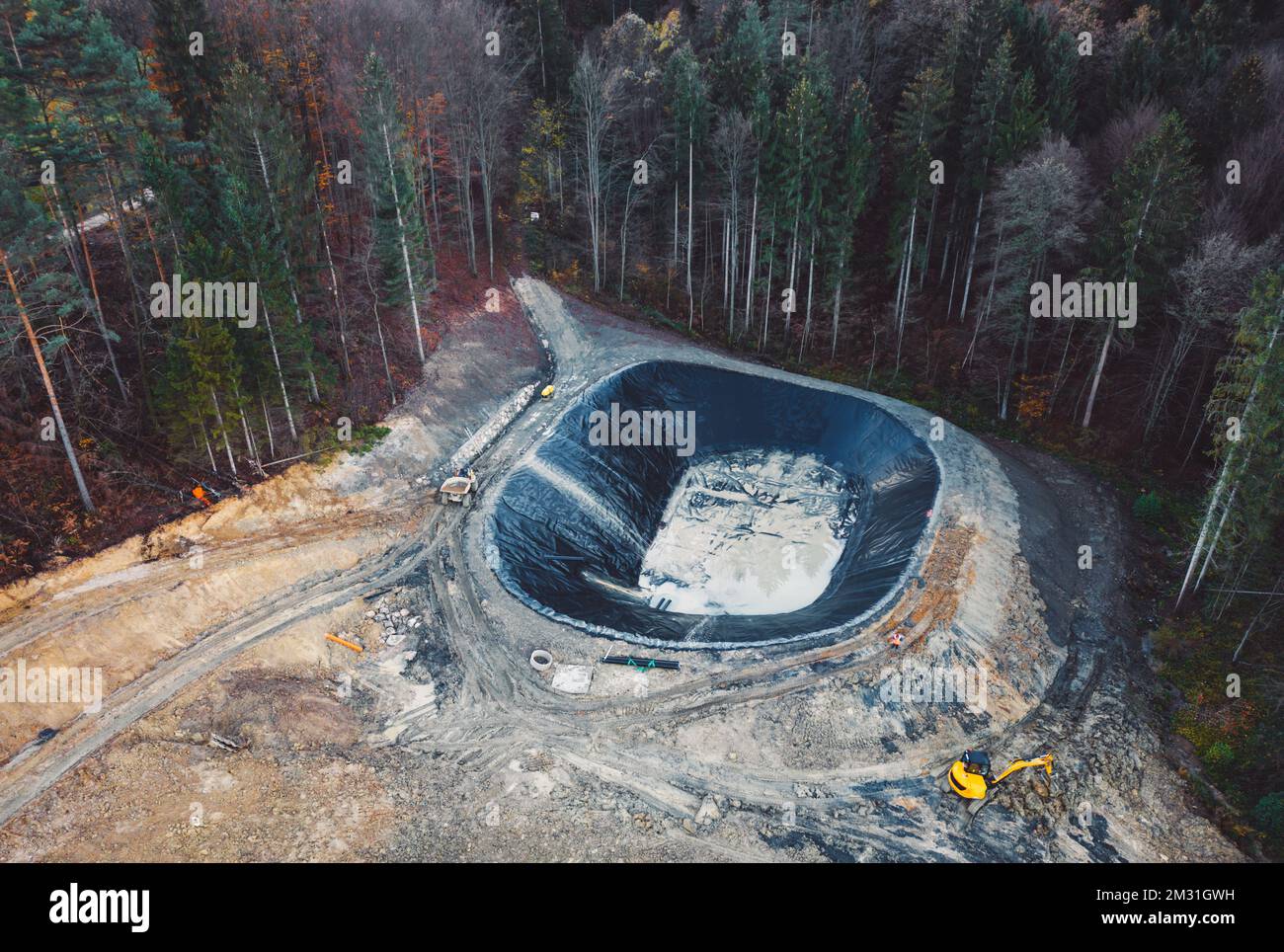 Construction site in the middle of a forest at an unknown location ...
