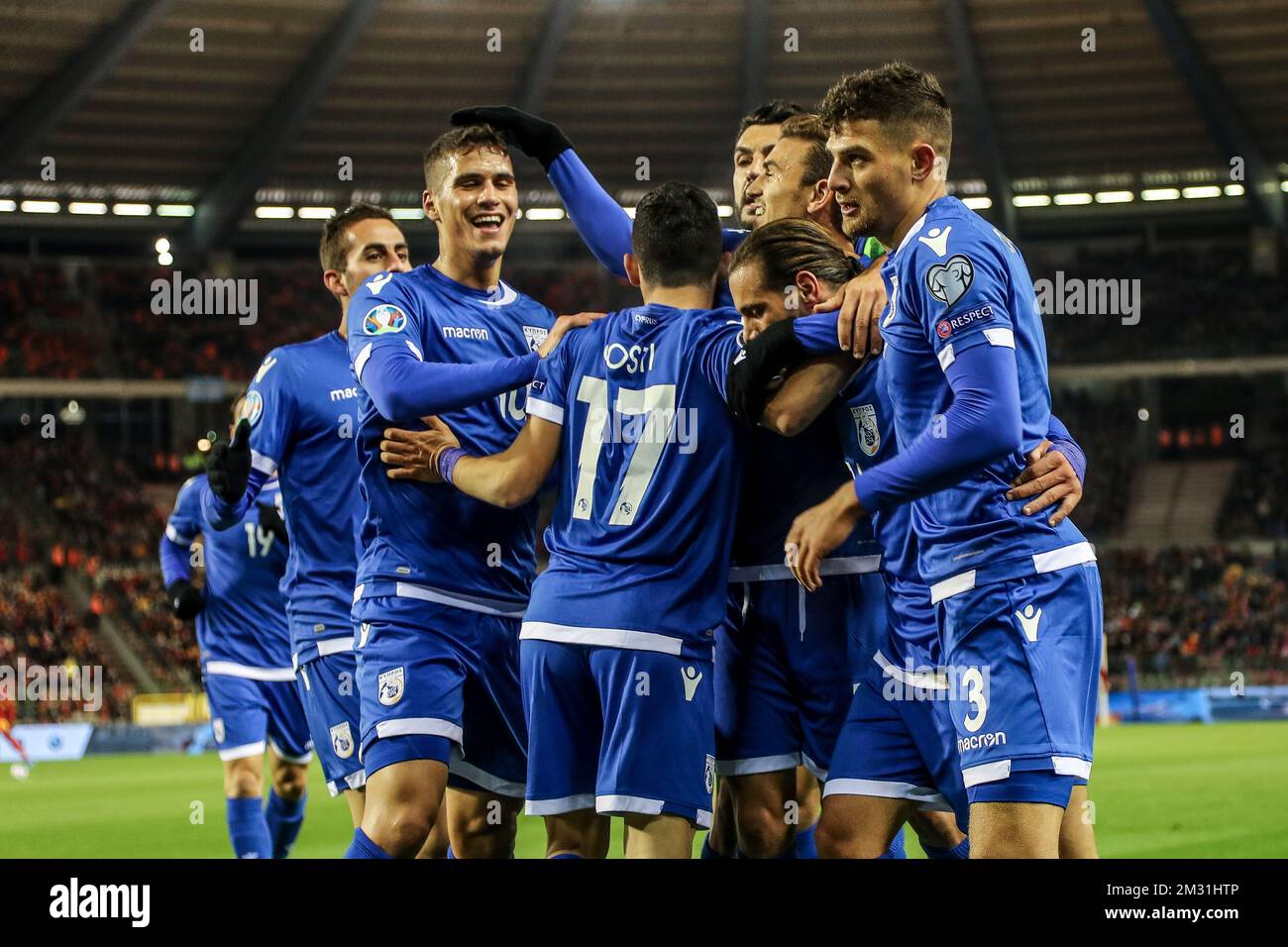 Cyprus' Nicholas Ioannou (R) celebrates with his teammates after ...