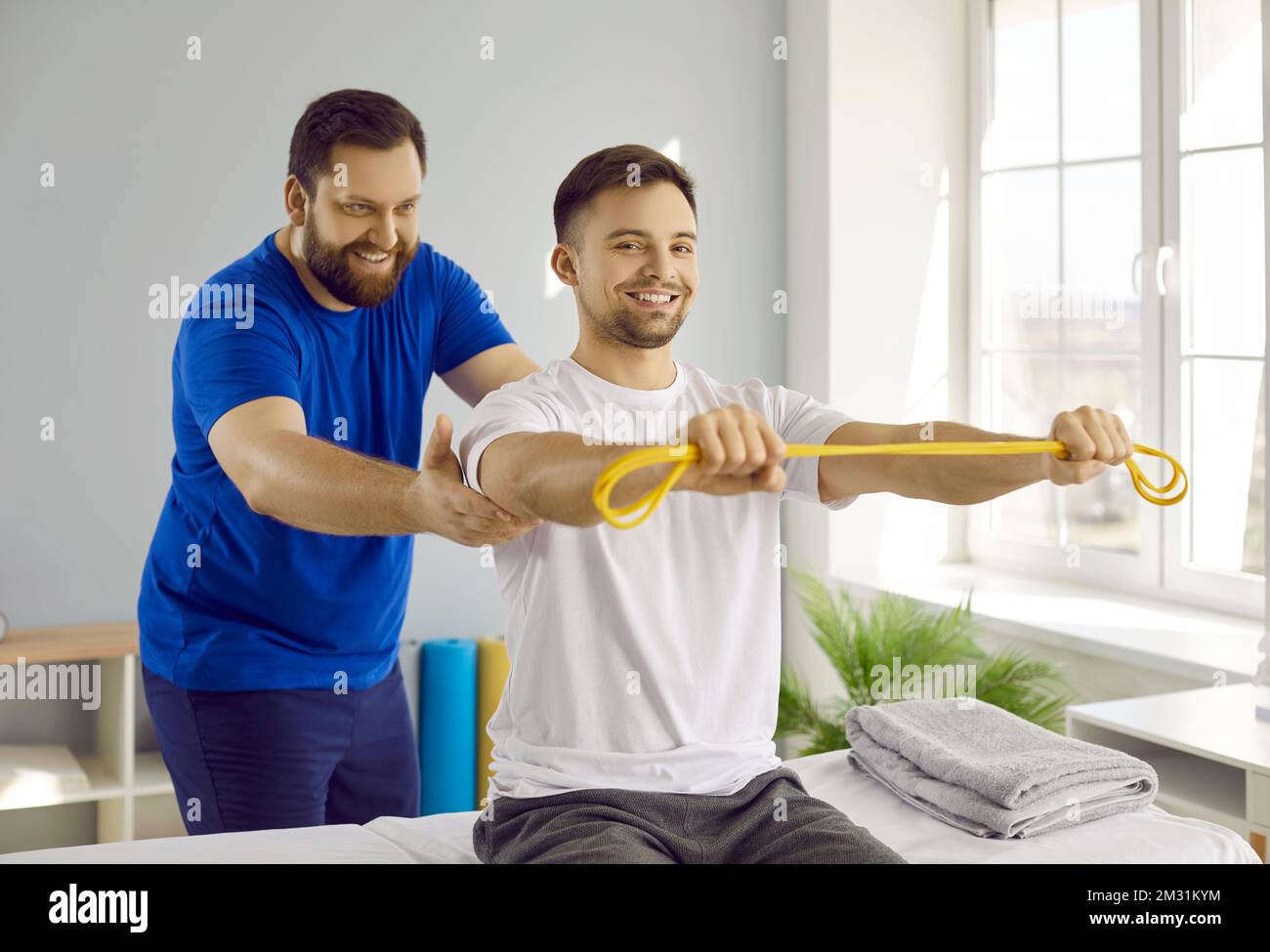 Patient do exercise with physiotherapist for trauma recovery Stock ...