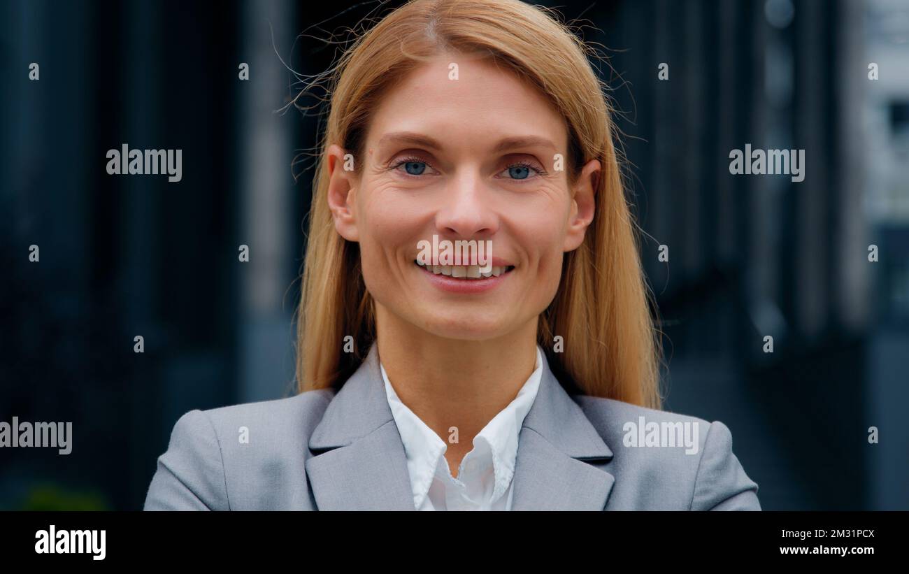 Zooming in on focus close-up female business portrait caucasian ...