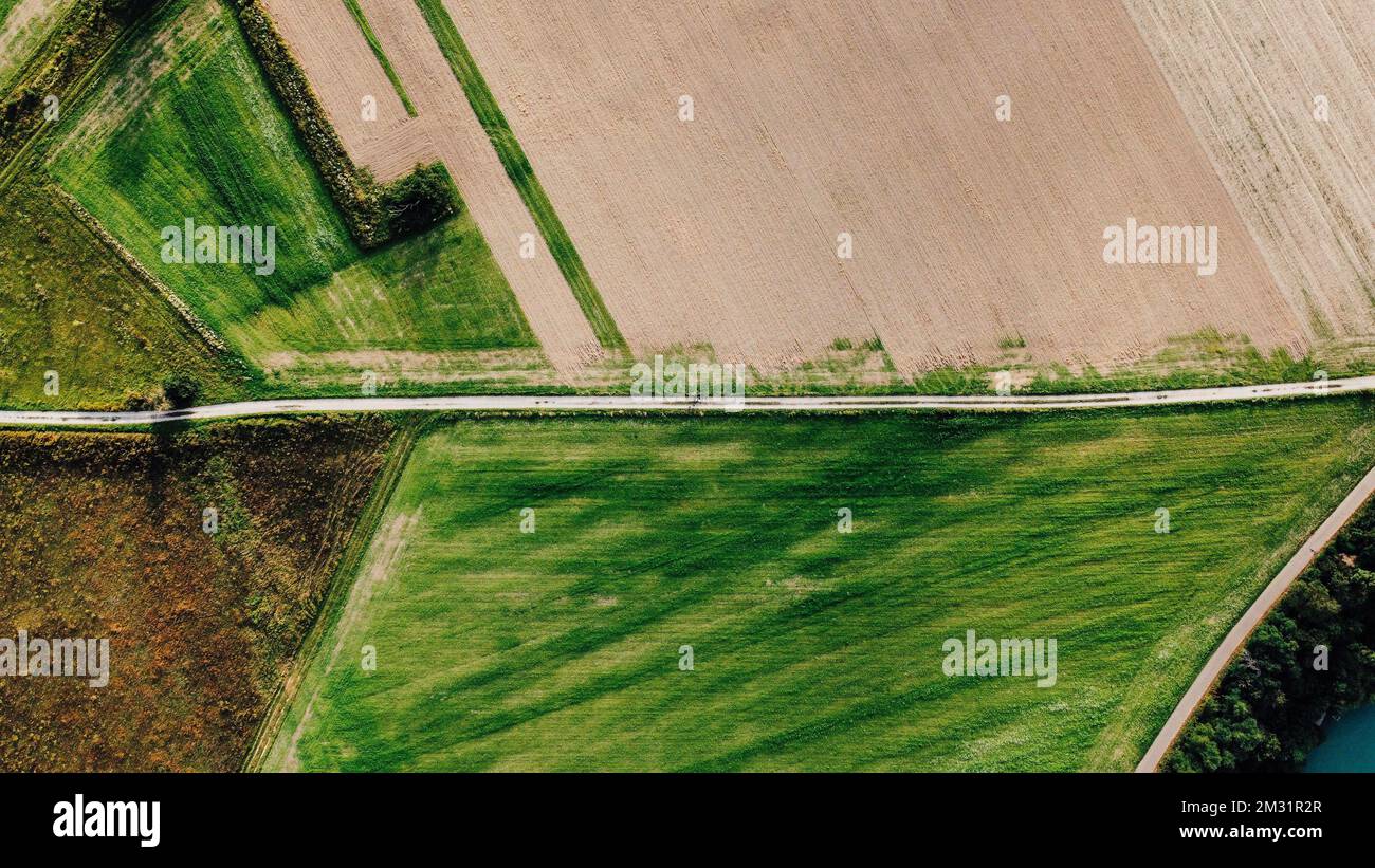An aerial view of green grass field at daytime Stock Photo - Alamy