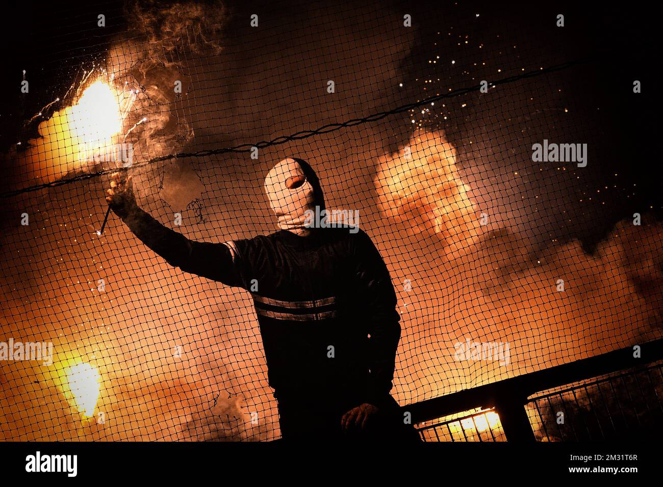 Illustration picture shows a Genk supporter holding fireworks during a ...