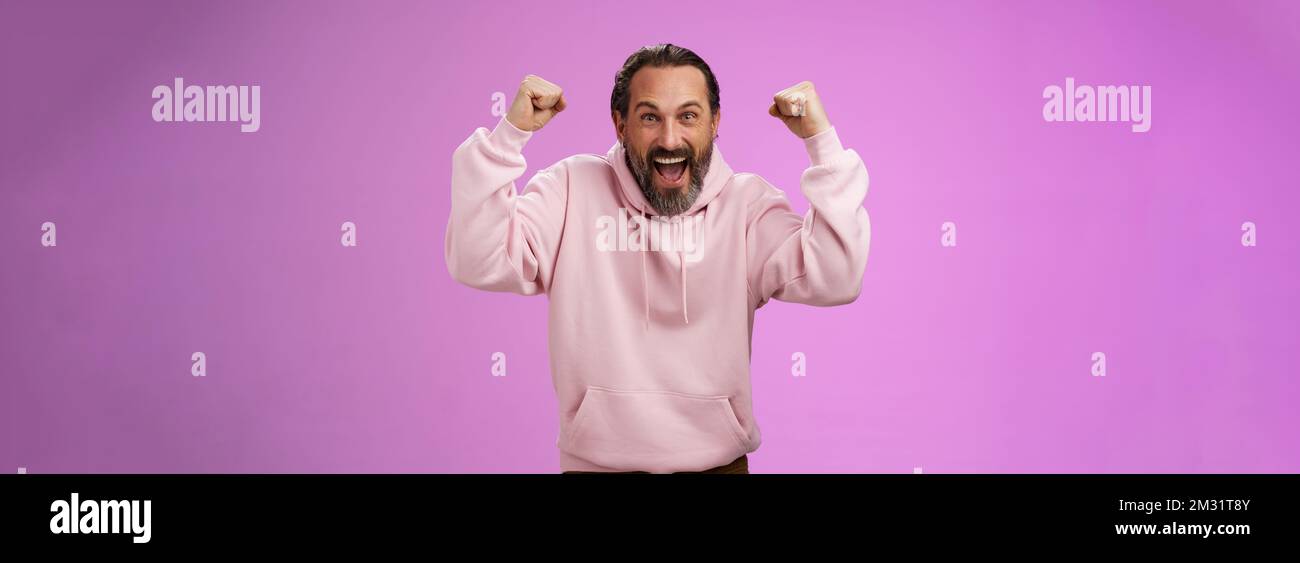 Excited cheering devoted male bearded grey hair yelling supportive ...