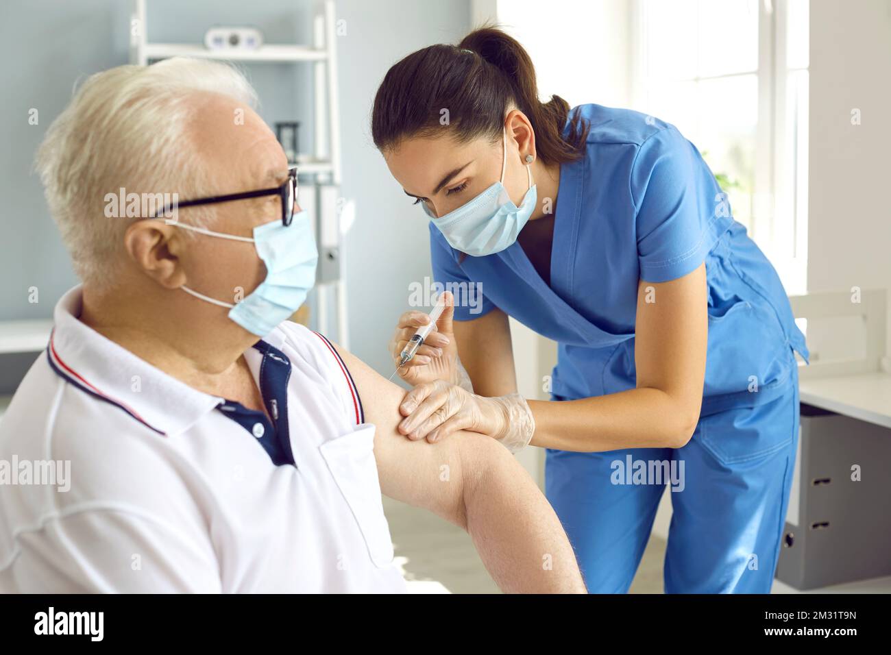 Woman injection old hi-res stock photography and images - Alamy