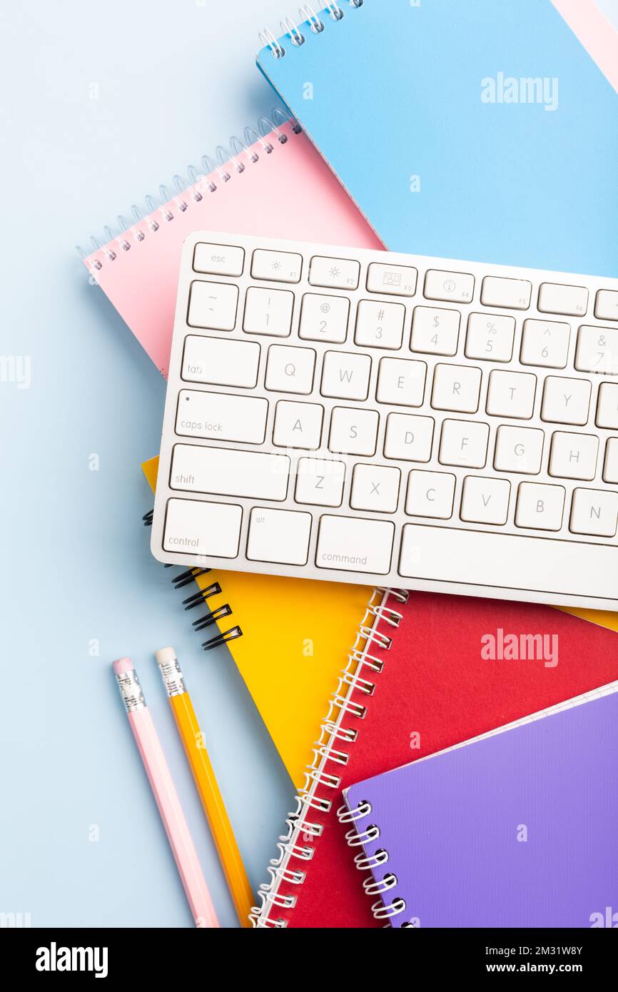 Keyboard with colored notepads. High quality photo Stock Photo - Alamy