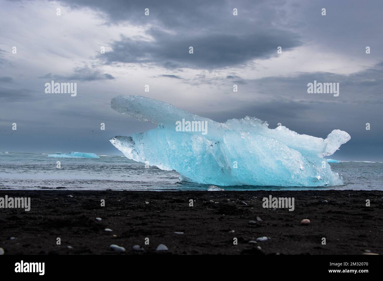 Diamond Beach black sand and Glacier Ice Pieces in the Jokulsarlon ...