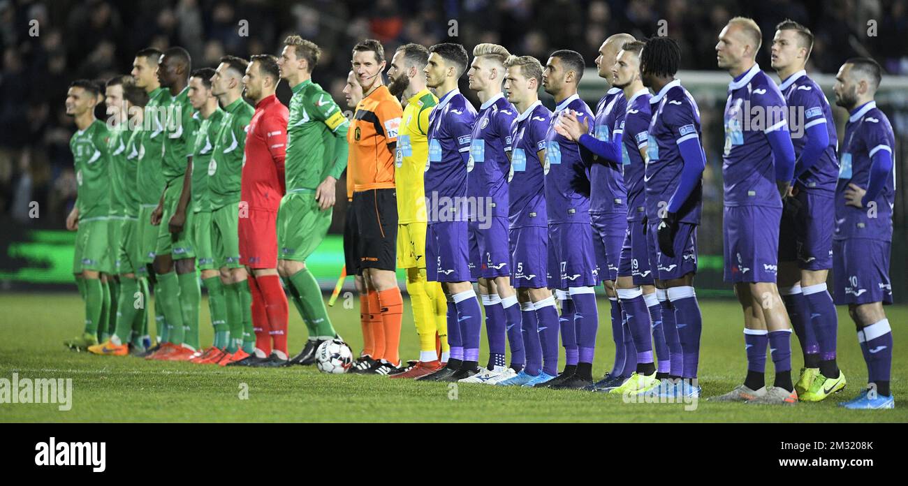 Lommel's players and Beerschot's players pictured before the start of a ...