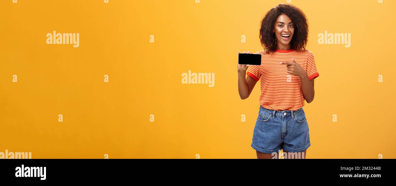Girl showing picture in phone bragging about her cool vacation ...
