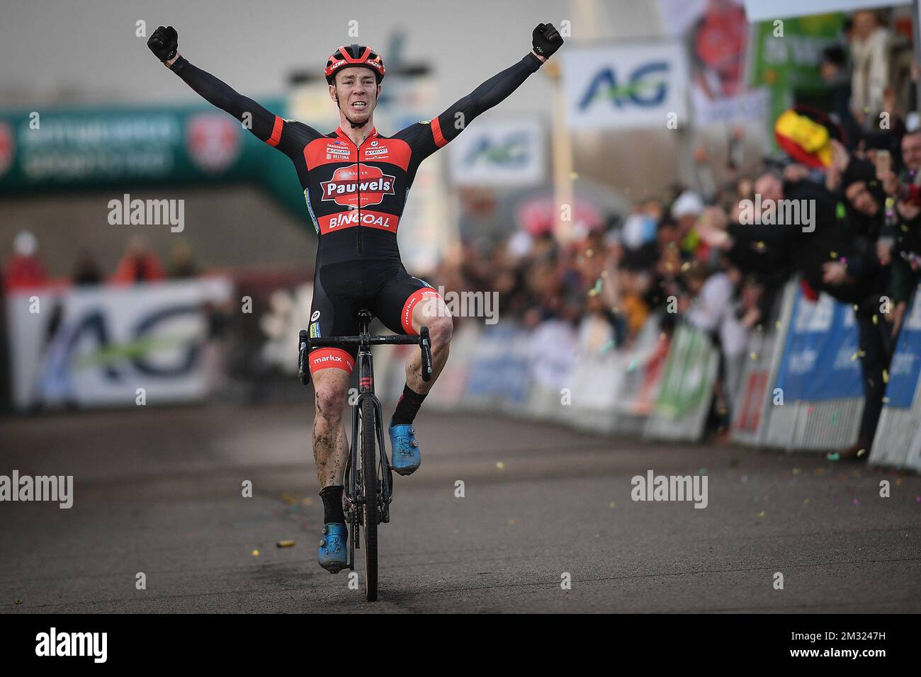 Belgian Laurens Sweeck celebrates as he crosses the finish line to win ...