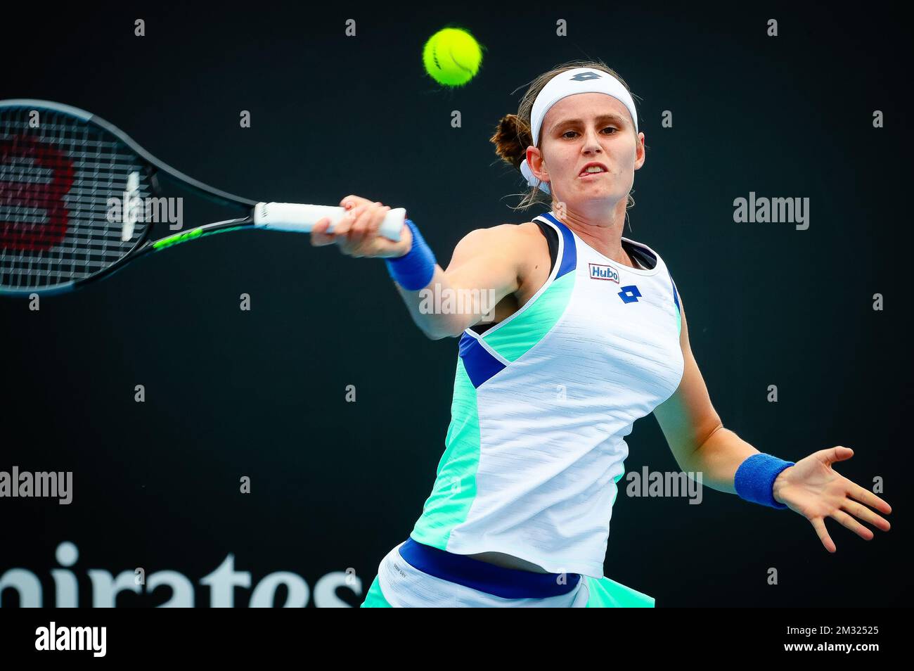 Belgian Greet Minnen plays a backhand at a first round match of the ...