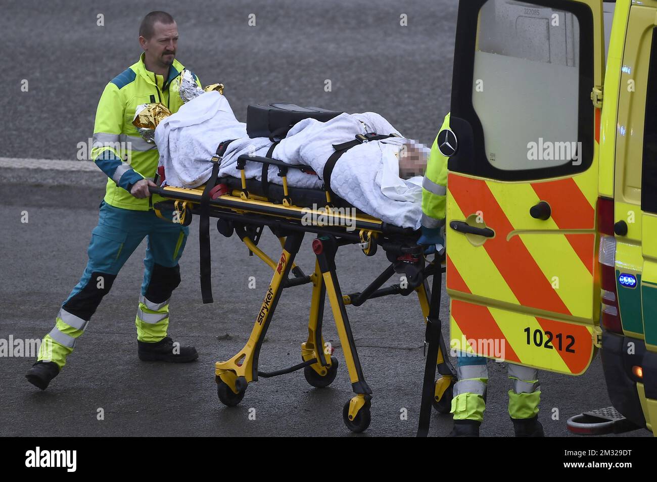 Illustration shows emergency services member busy with the evacuation ...