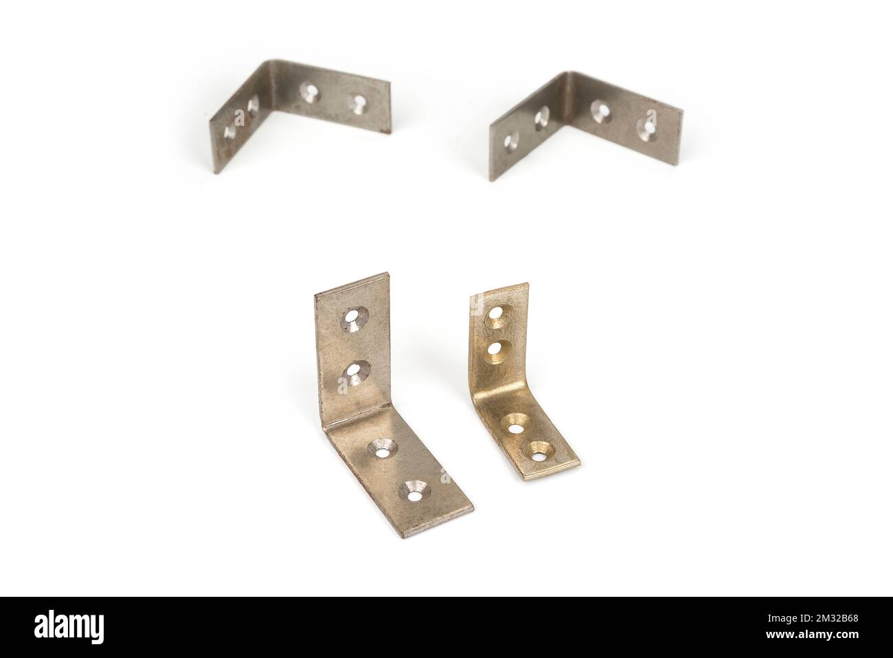 90 degree metal bracket for furniture on a white Stock Photo - Alamy