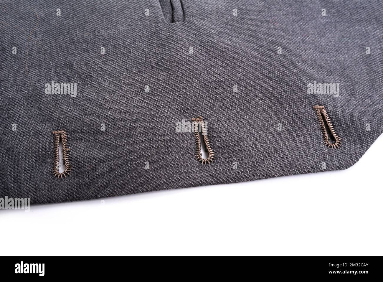 Buttonholes on the vest under the suit Stock Photo - Alamy