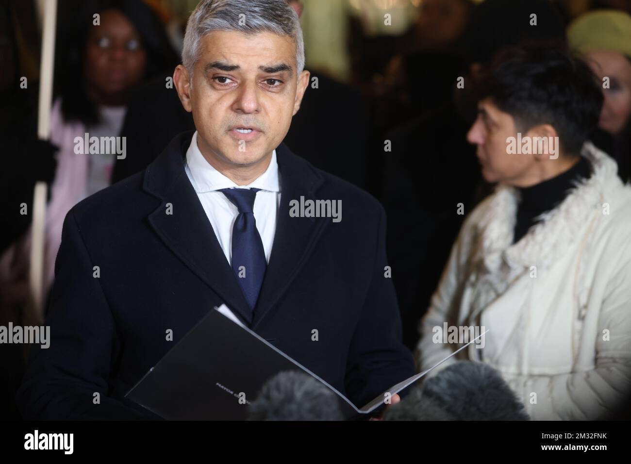 Mayor of London, Sadiq Khan reads a statement outside the Old Bailey in ...