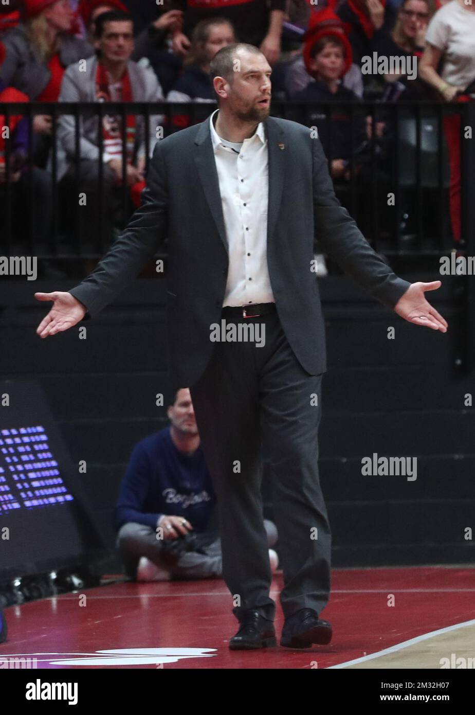 Antwerp's head coach Christophe Beghin looks dejected during a ...