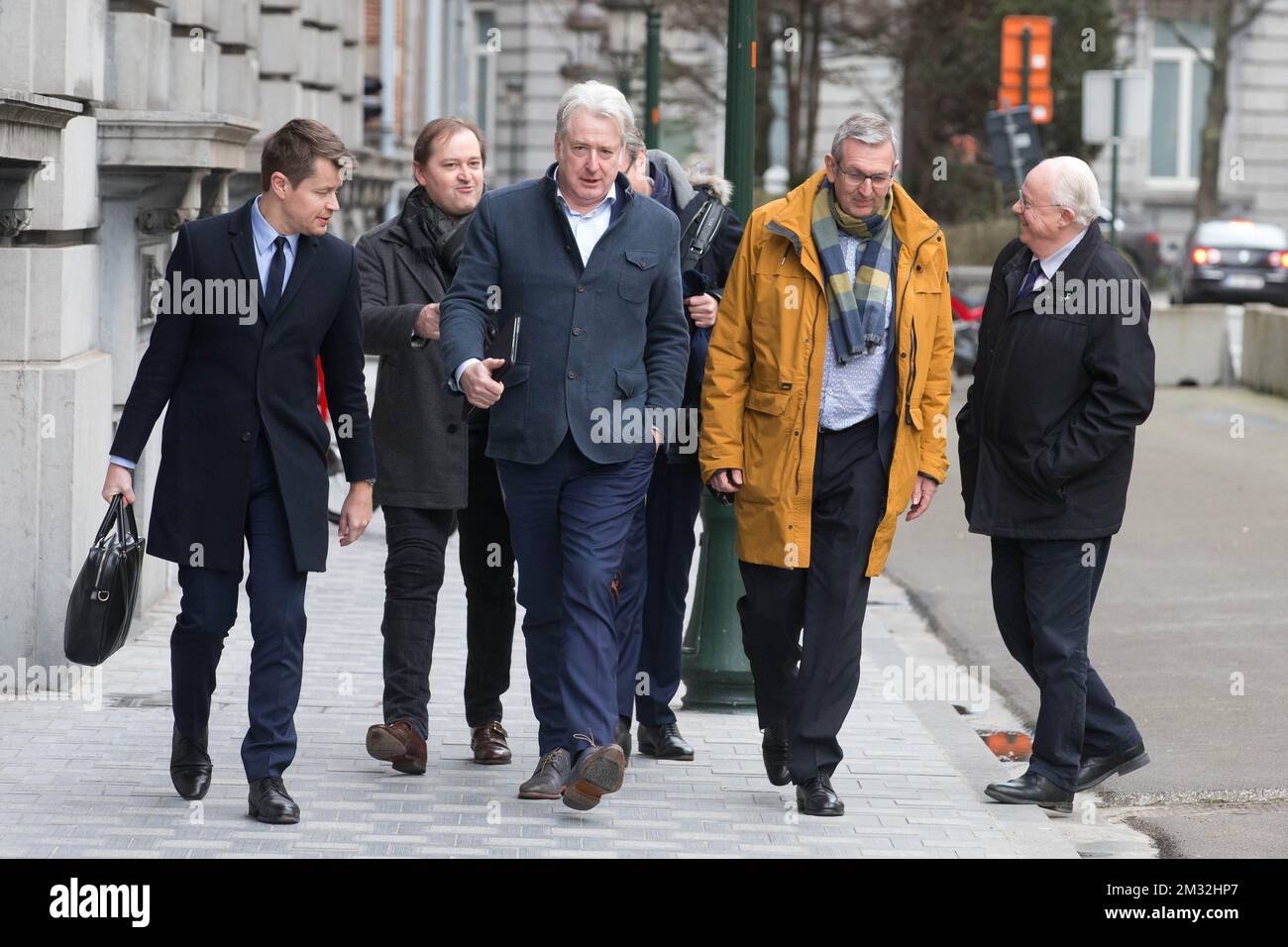 Mathias De Caluwe, Eric Catry (2R) and Philippe Trine arrive for a ...