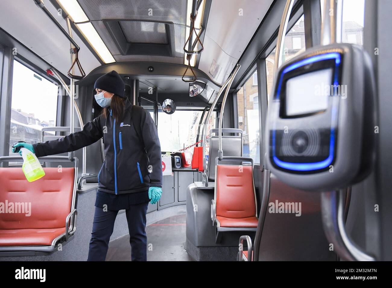 Illustration picture shows a STIB-MIVB worker wearing mouth mask and ...