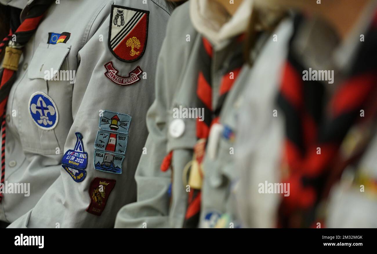 Hamburg, Germany. 14th Dec, 2022. Scouts sit before the handover of the ...