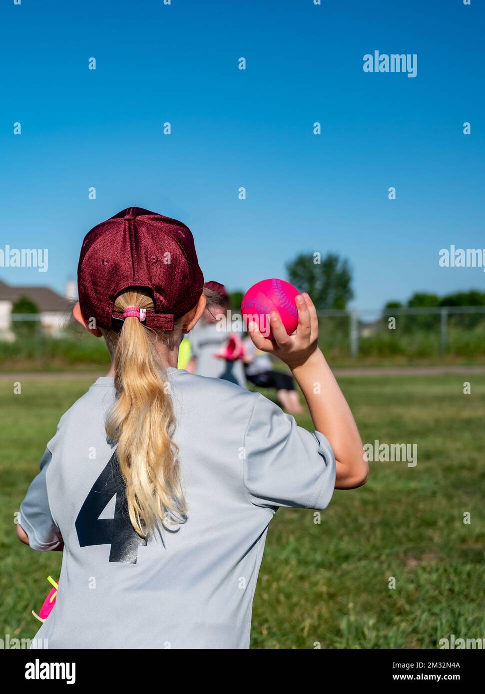 Girl throw baseball hi-res stock photography and images - Alamy