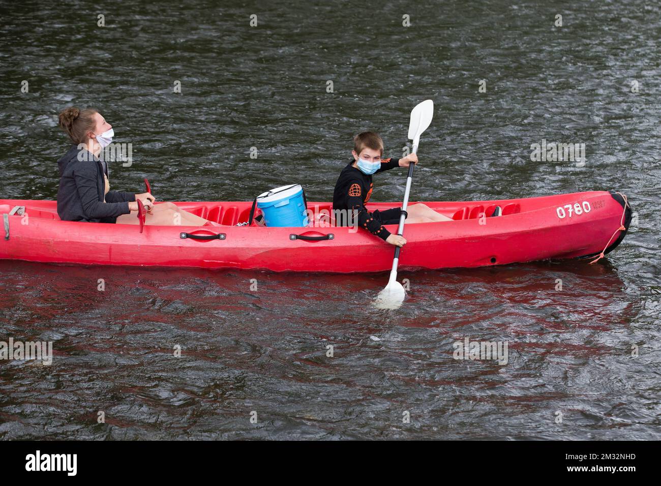 Illustration picture shows two boys wearing a mouth mask starting a ...