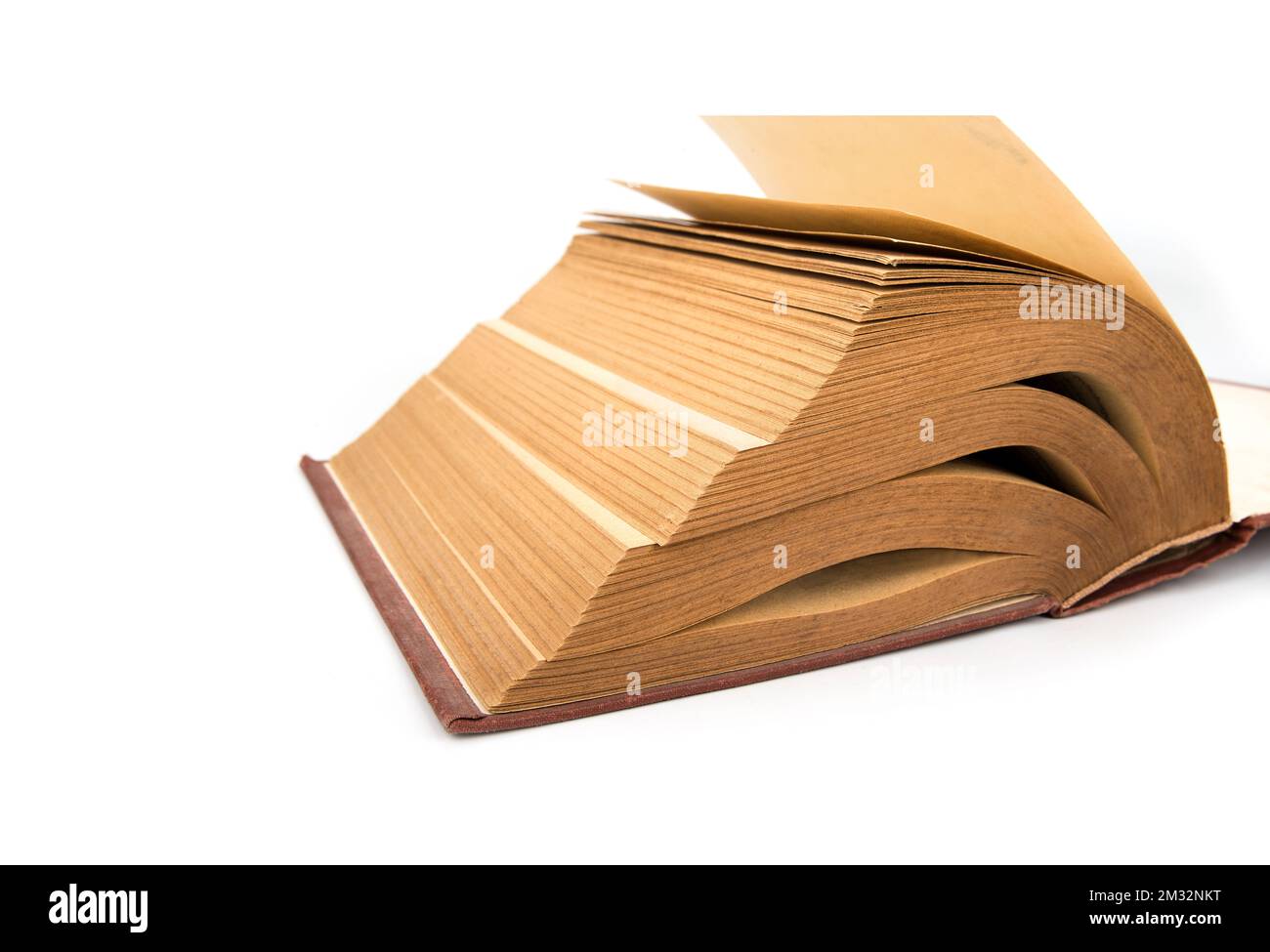 Open thick vintage book on a white Stock Photo - Alamy
