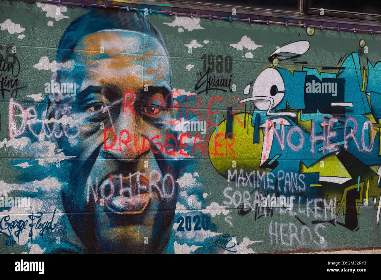 Illustration picture shows a besmirched graffiti of George Floyd at the ...