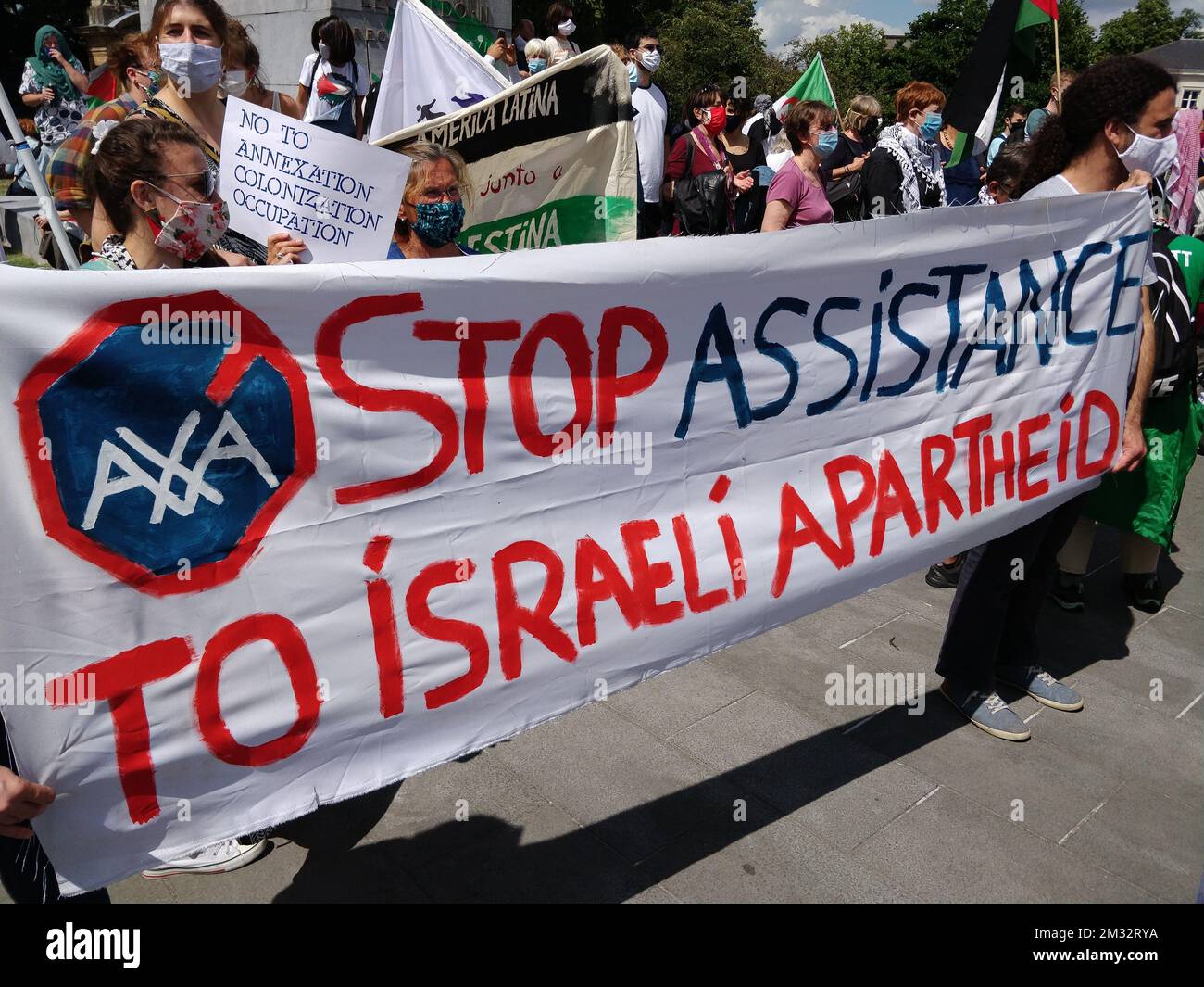 Illustration picture shows a banner against AXA during a 'static ...
