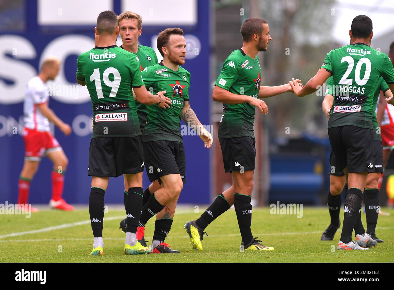 Cercle's players celebrate after scoring during a friendly game between ...