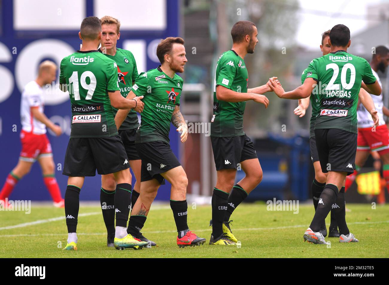 Cercle's players celebrate after scoring during a friendly game between ...