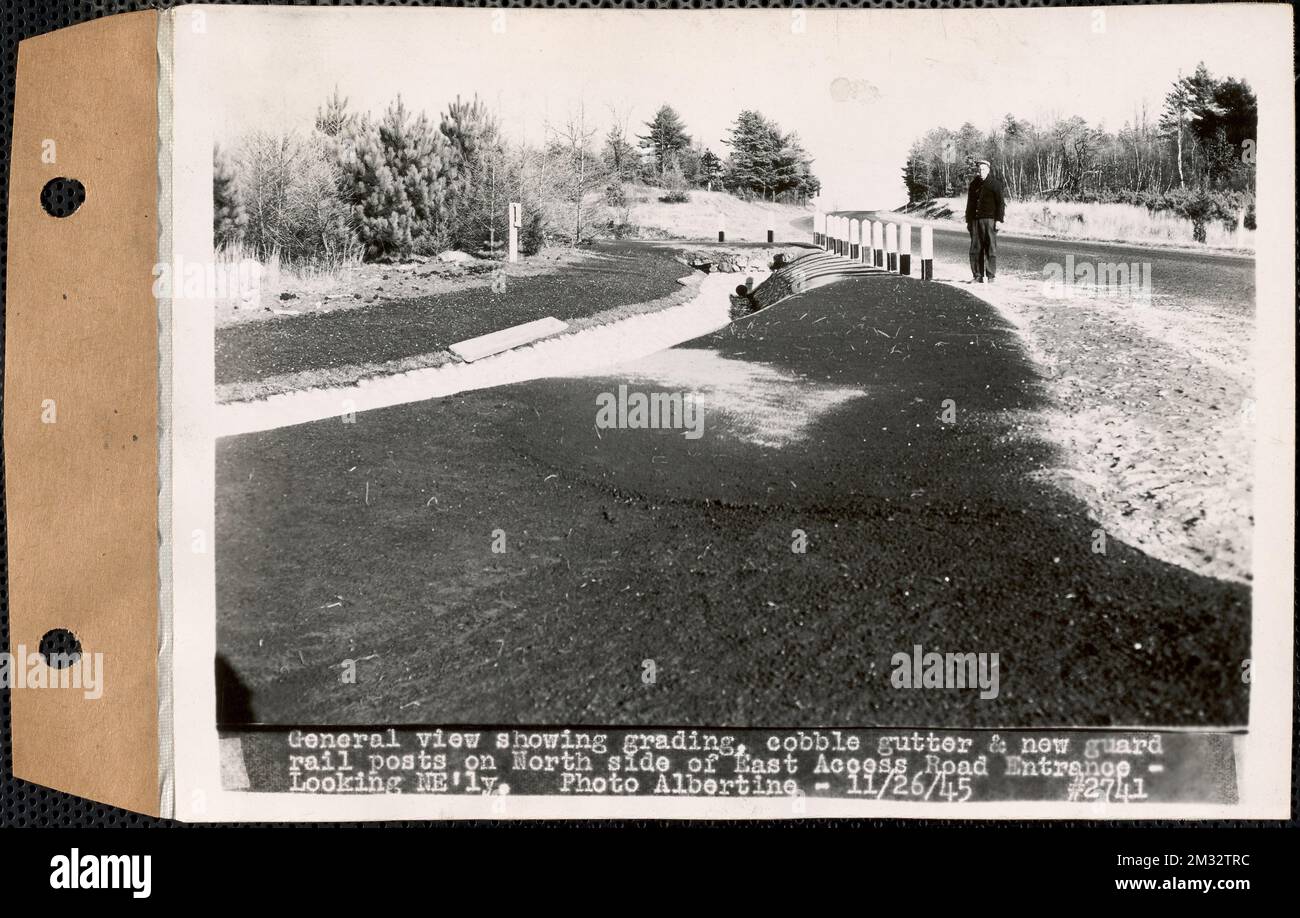 General view showing grading, cobble gutter, and new guard rail posts ...