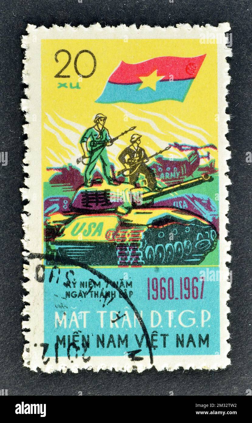 Cancelled postage stamp printed by Vietnam, that shows Vietcong ...