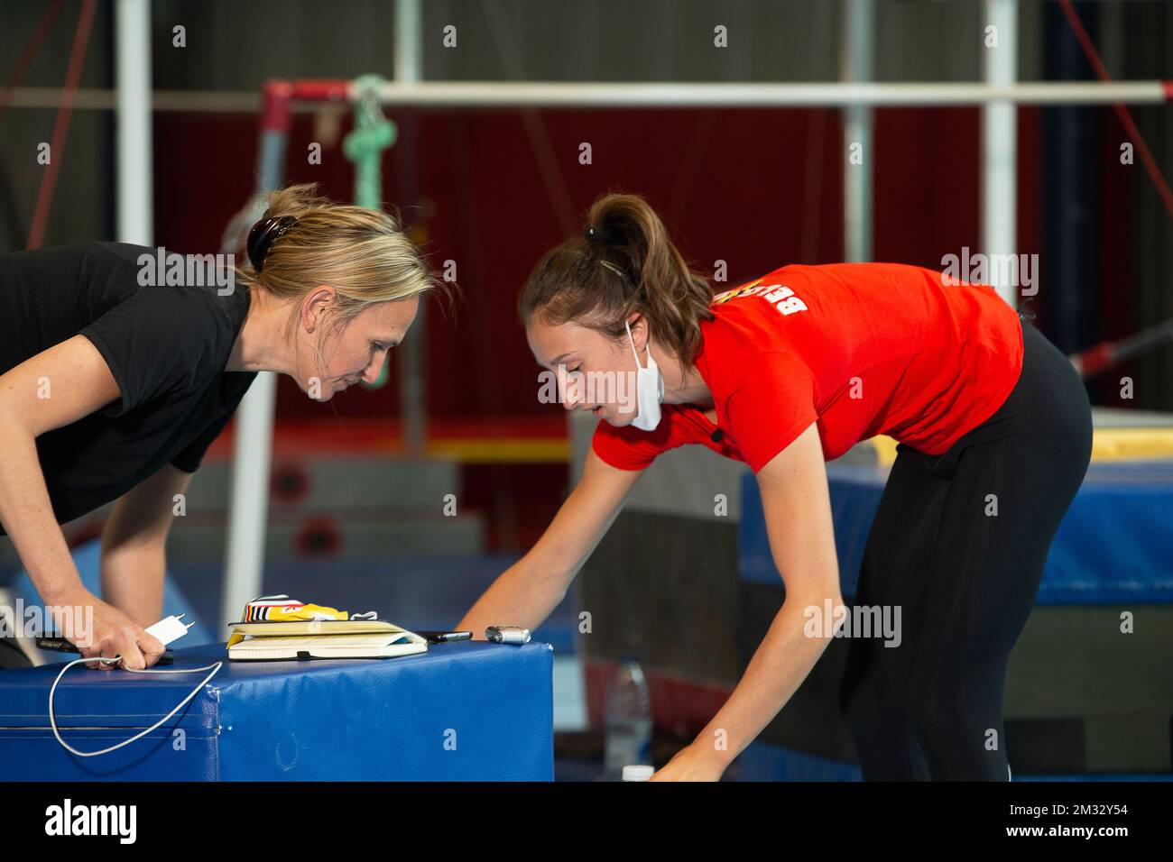 Belgian gymnastic coach Marjorie Heuls and Belgian gymnast Nina Derwael ...