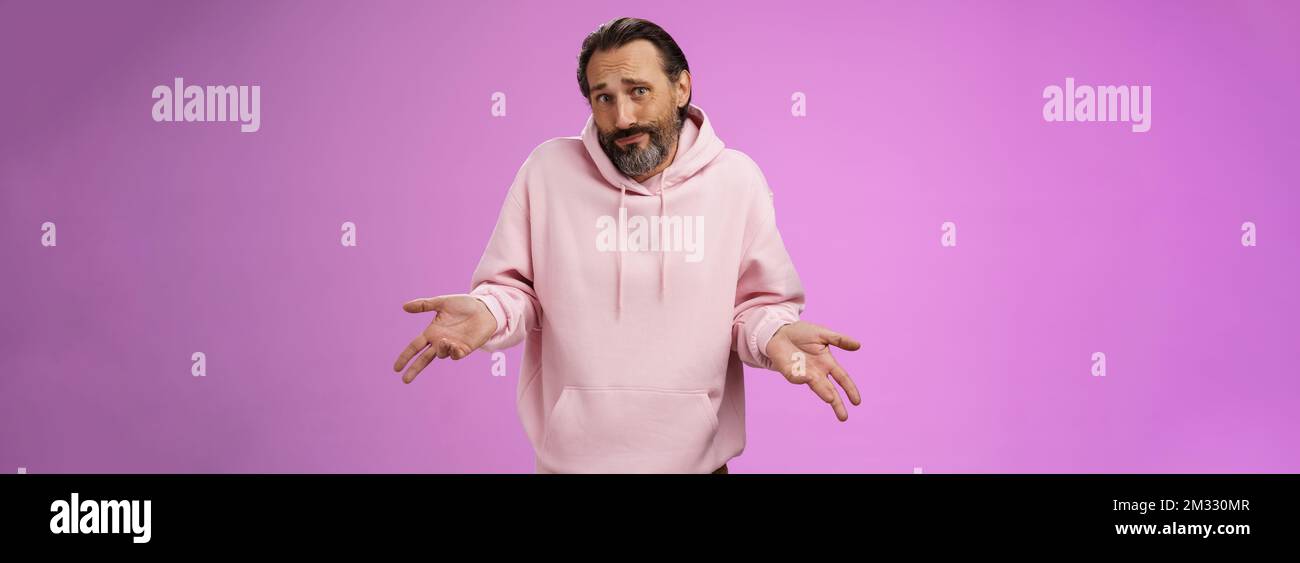 Portrait clueless unaware father cringing smirking uncertain shrugging ...