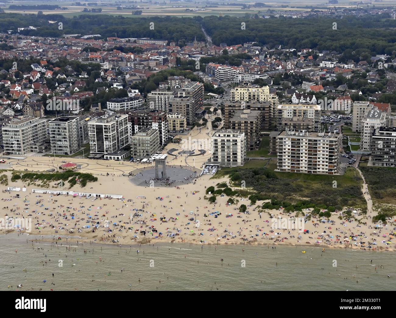 an aerial view of the beach in De Panne taken from a helicopter, flying ...