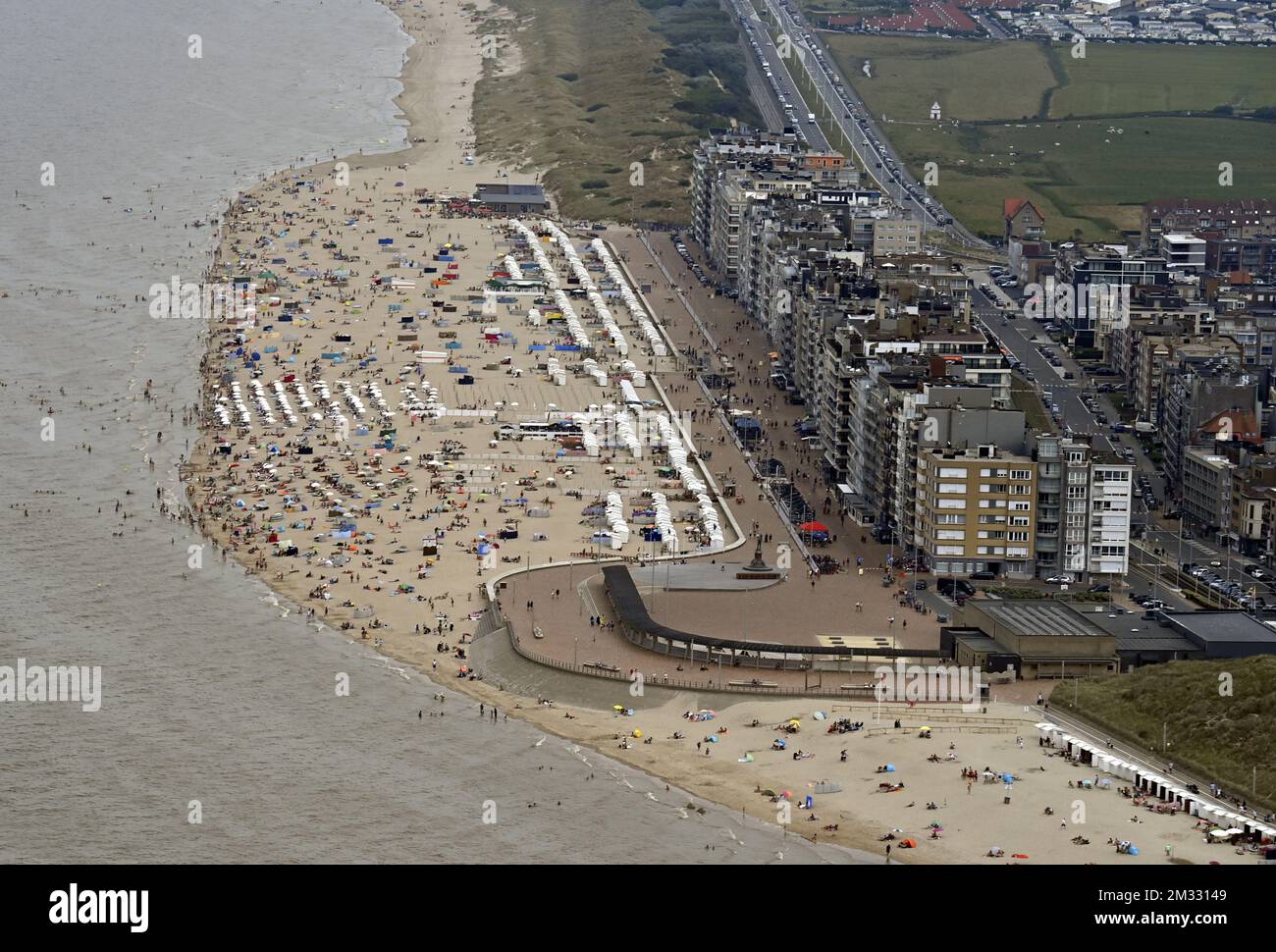 an aerial view of the beach in Wenduine taken from a helicopter, flying ...