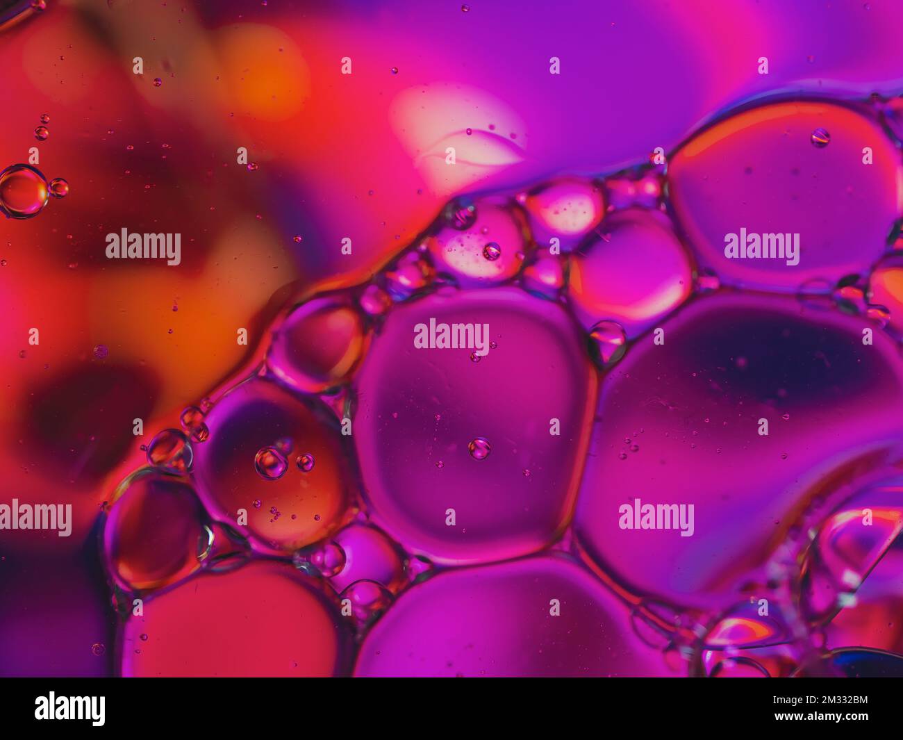 Abstract water bubbles in oil on a colored background Stock Photo - Alamy