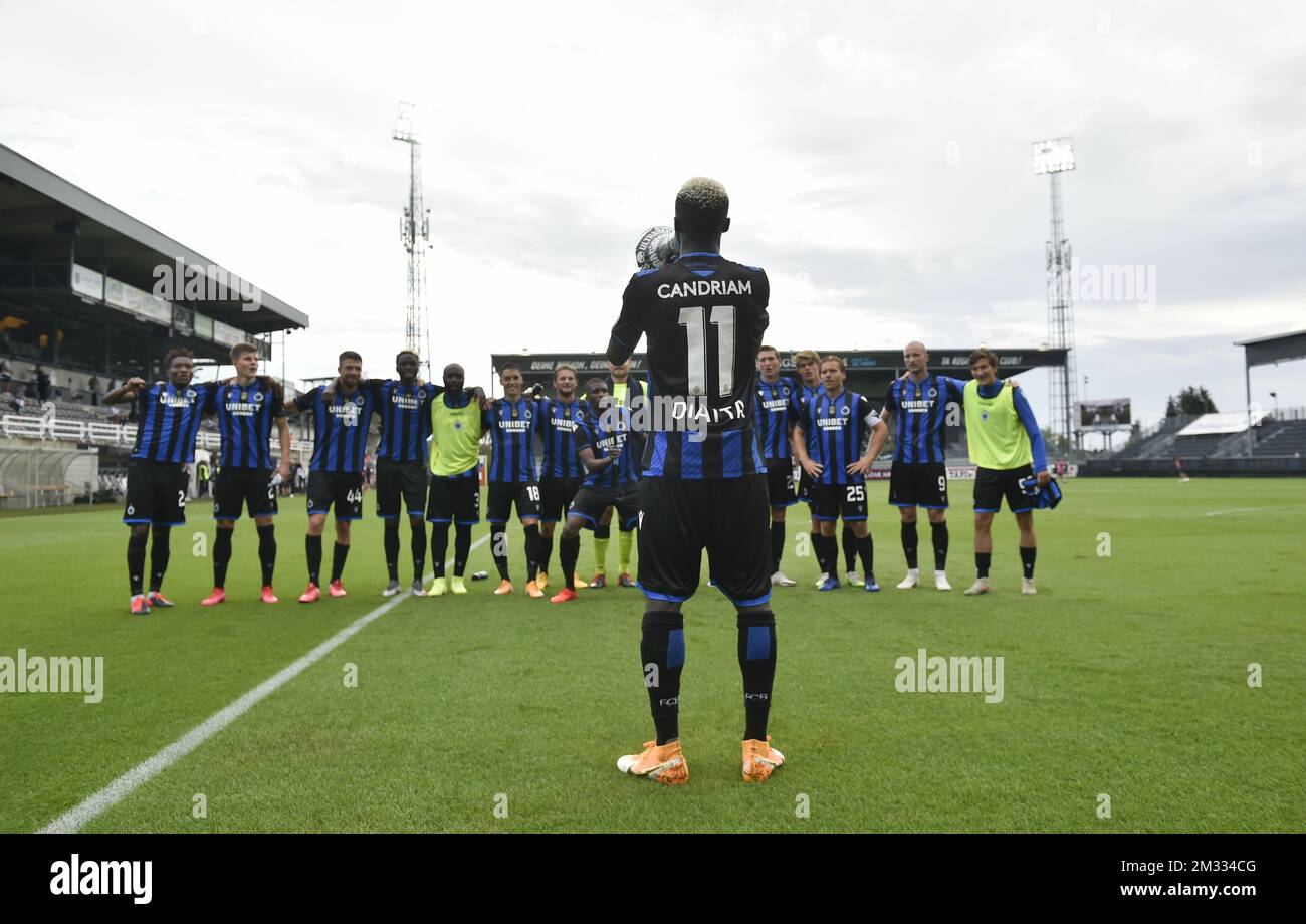 Club's players celebrate after winning a soccer match between KAS Eupen ...