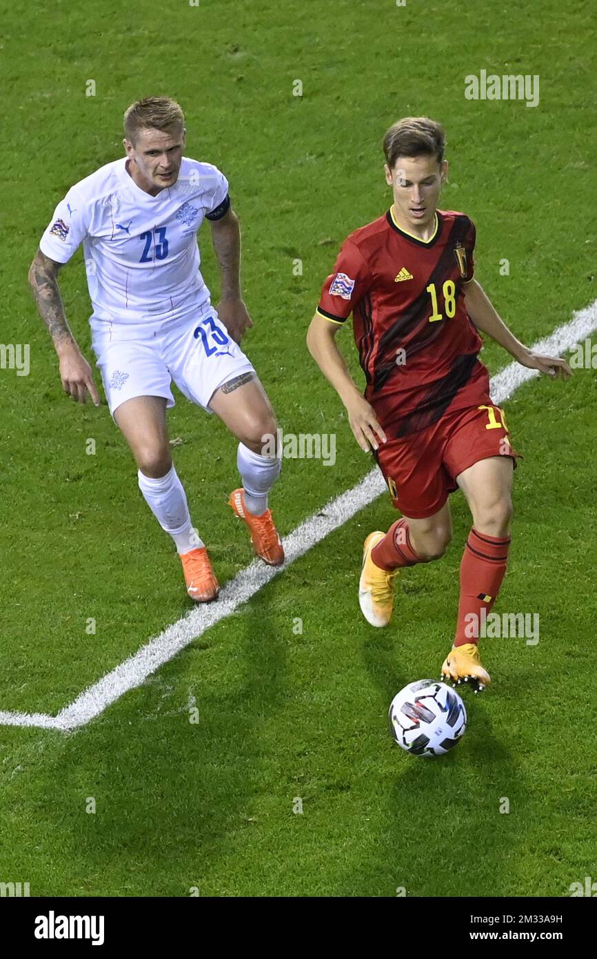 Iceland's captain Ari Skulason and Belgium's Yari Verschaeren fight for ...