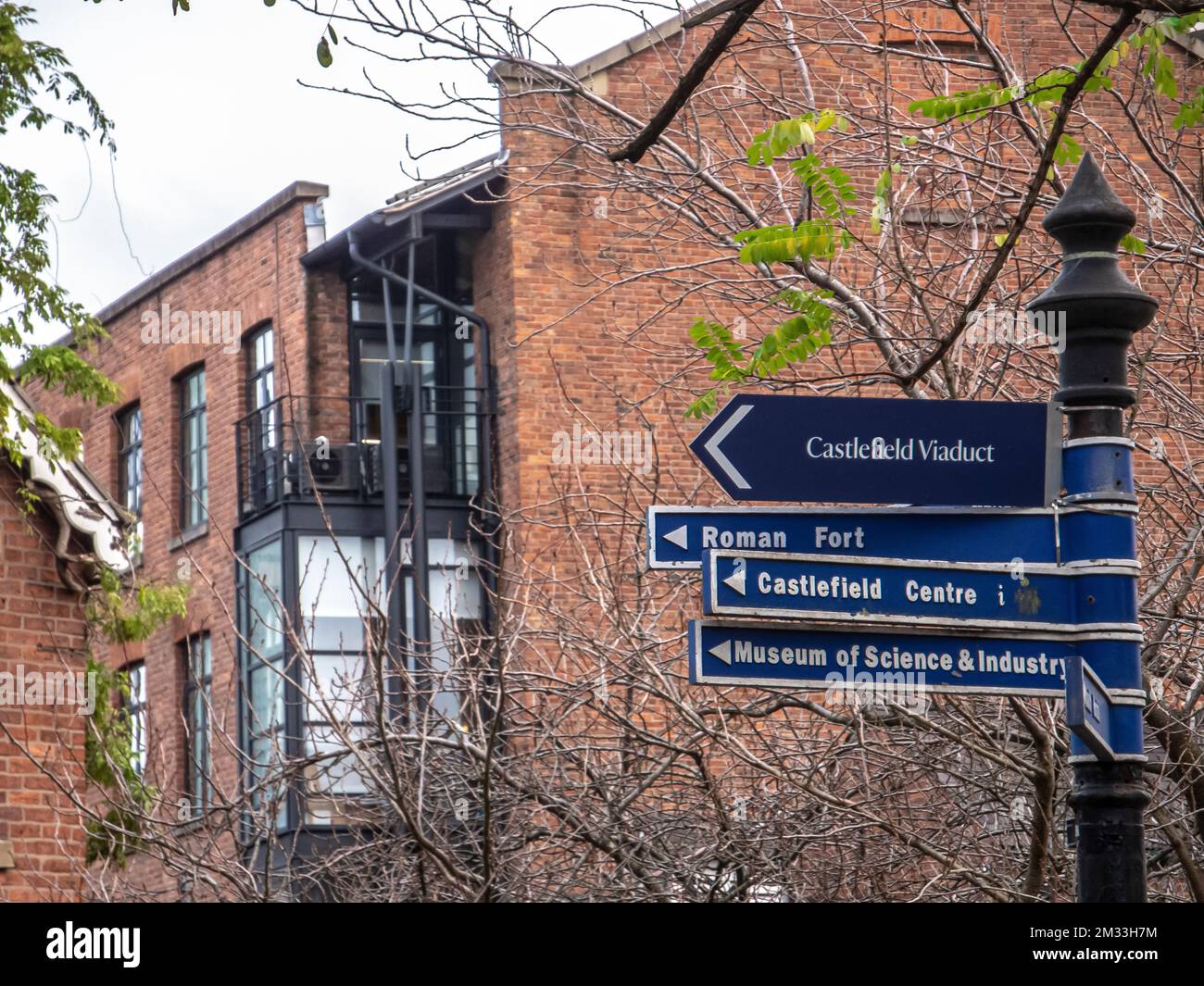 Signs on the streets of Manchester Stock Photo - Alamy