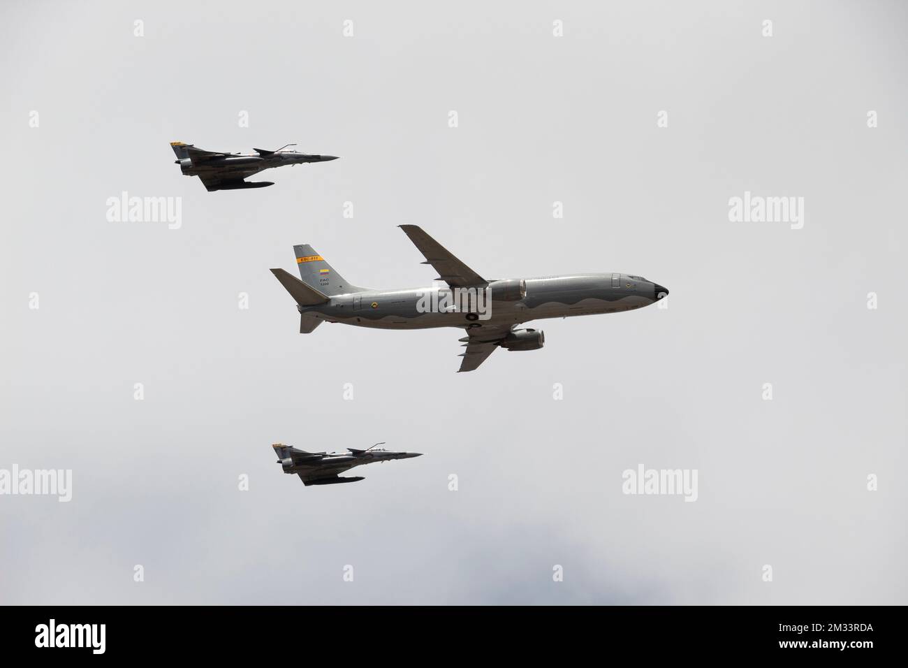 Closeup to a Boeing 767 and two Kfir airplanes flying during colombian ...
