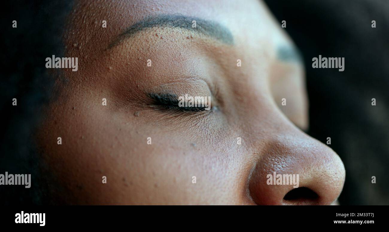 African female eyes opening close hi-res stock photography and images ...