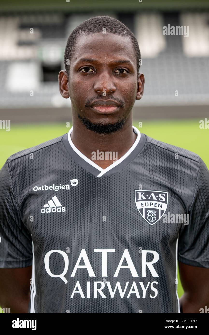 Eupen's assistant trainer Ibrahim Diallo poses for the photographer, in ...