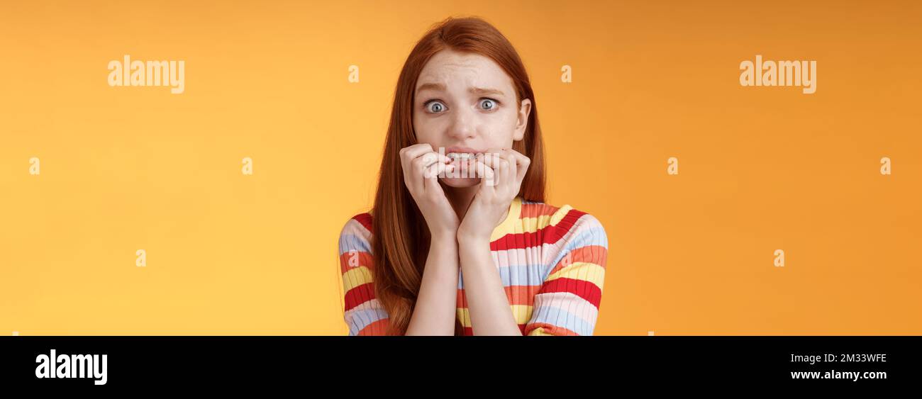 Anxious unconfident timid insecure redhead cute girl worry trembling ...