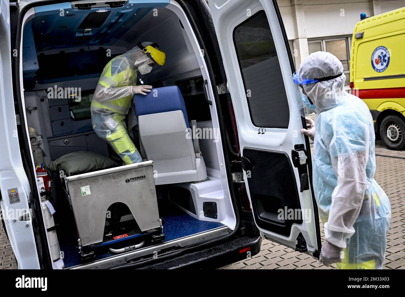 Illustration picture shows care workers in protective gear with mouth ...