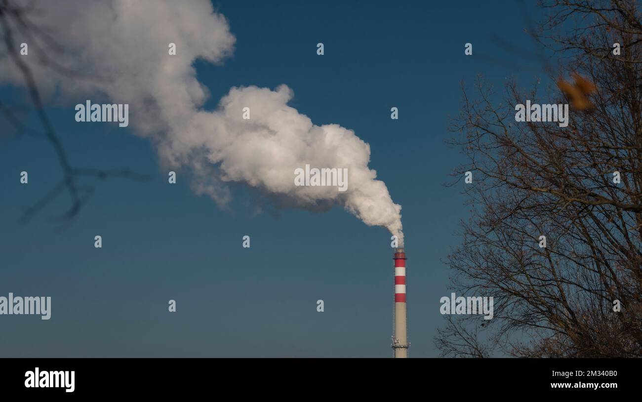 Color chimney with white smoke and light blue background Stock Photo ...