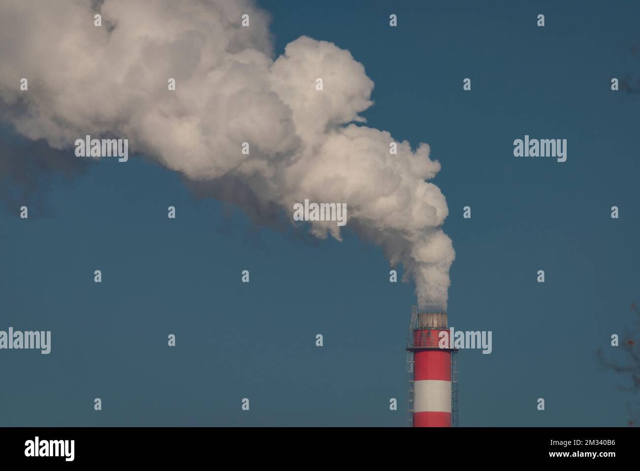 Color chimney with white smoke and light blue background Stock Photo ...