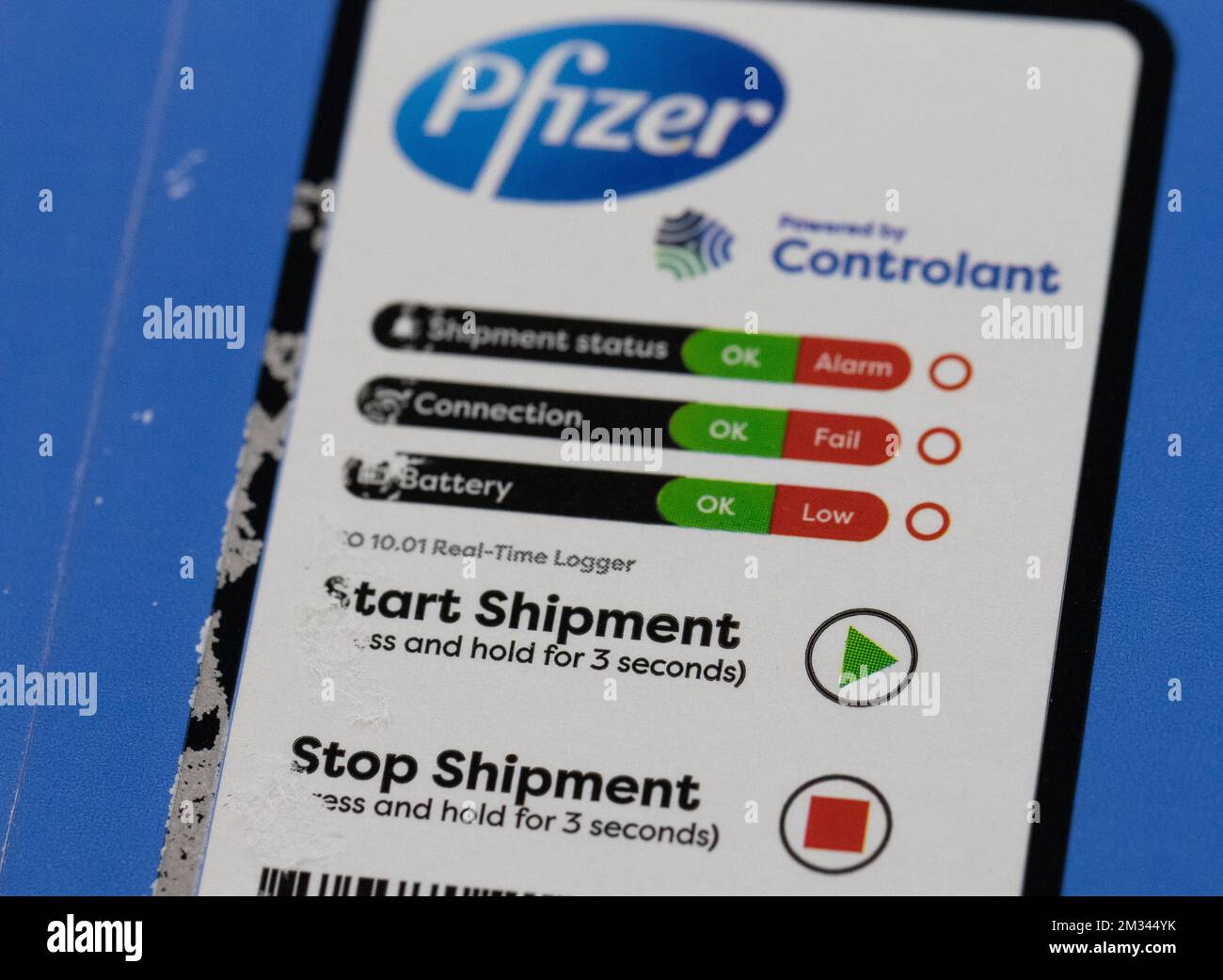 Illustration picture shows a Pfizer logo on a box with dummy vaccines ...