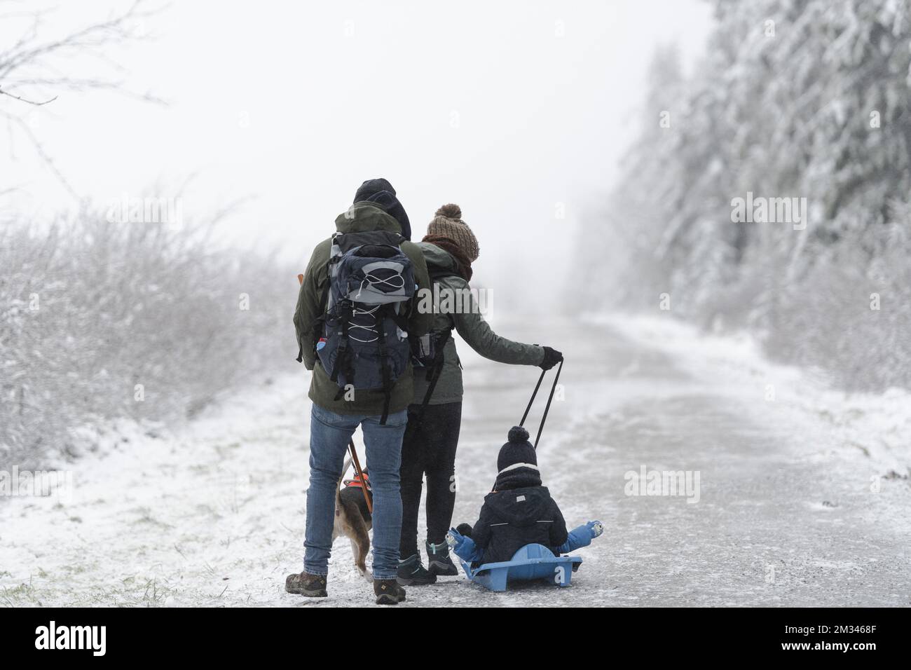 Illustration shows people walking in a winter landscape with snow at ...