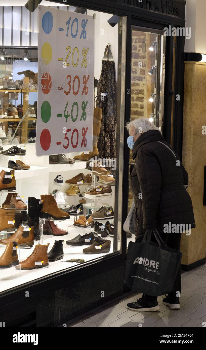 Illustration shows posters with the colours for reductions from ten ...