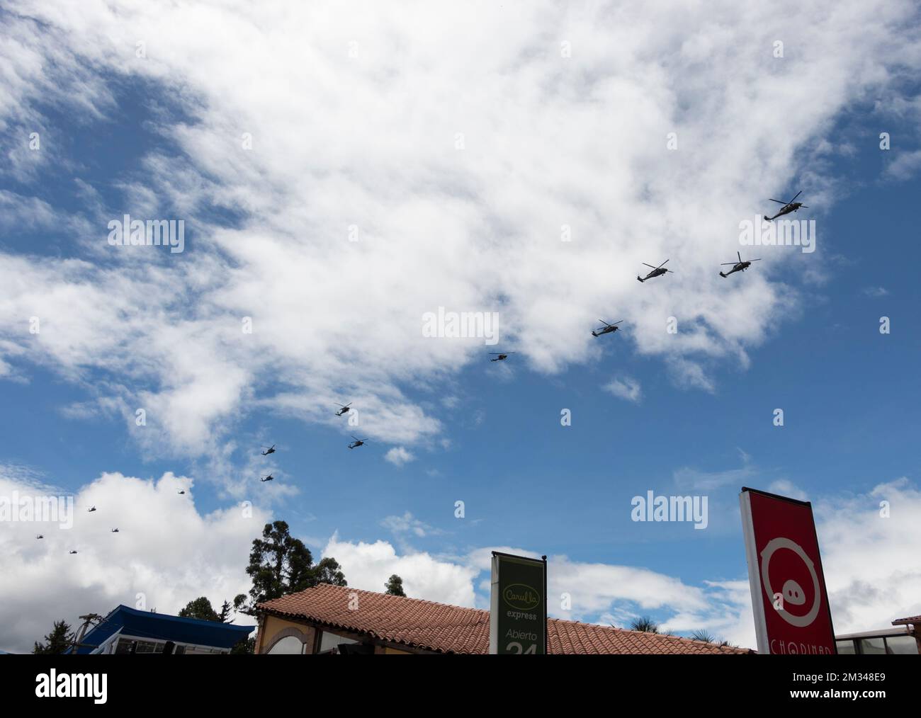 full army helicopter squad flying over crow during independence day ...